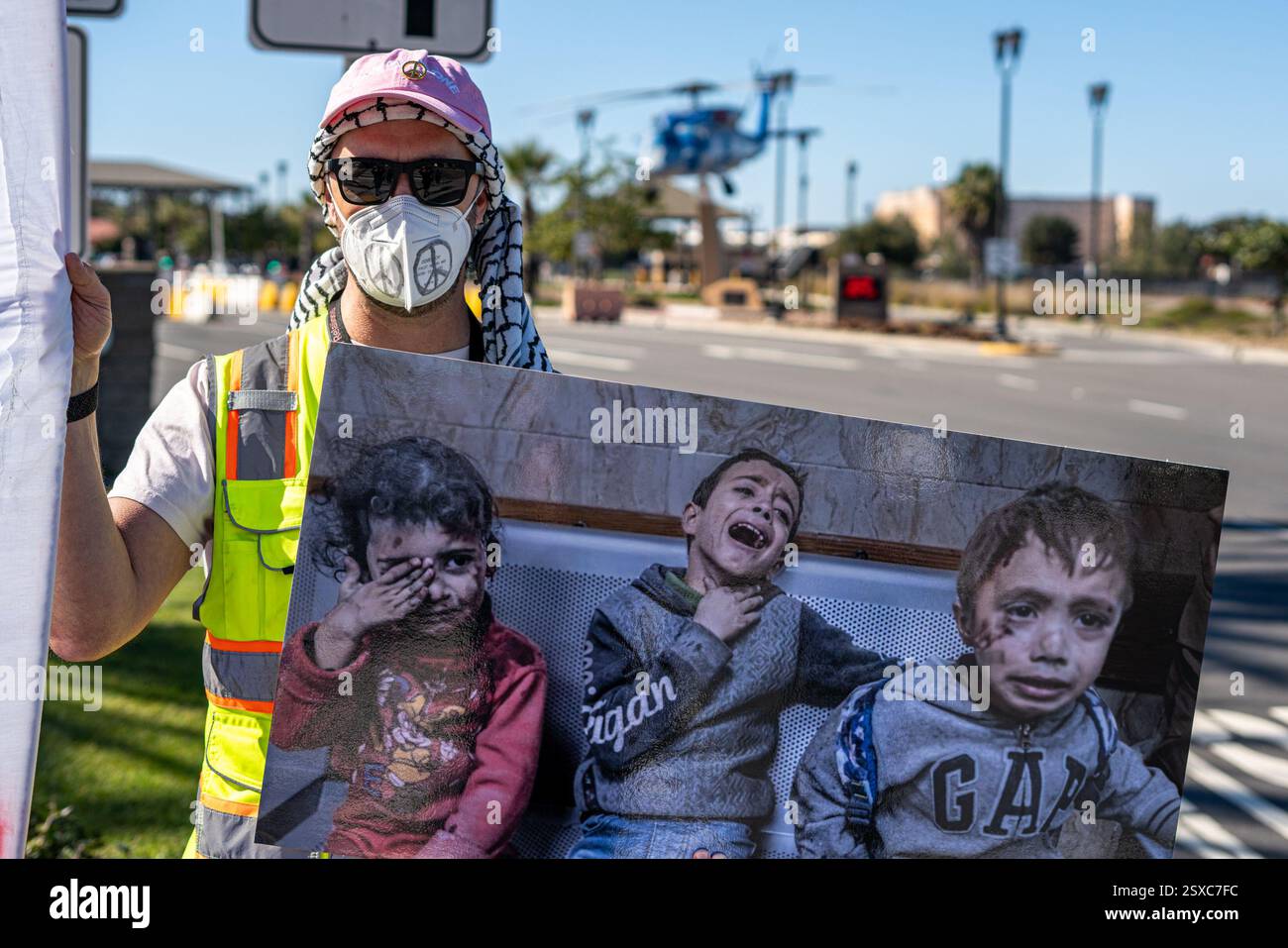Coronado, USA. 23rd Feb, 2025. A pro-Palestinian activist denounces ...