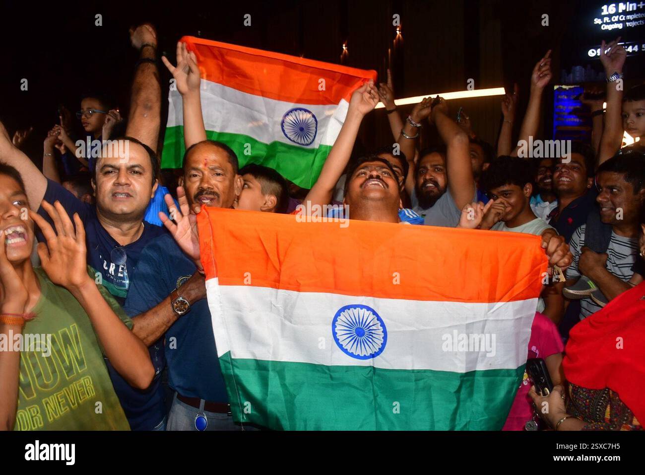 MUMBAI, INDIA - FEBRUARY 23: Fans gather to celebrate India’s victory ...