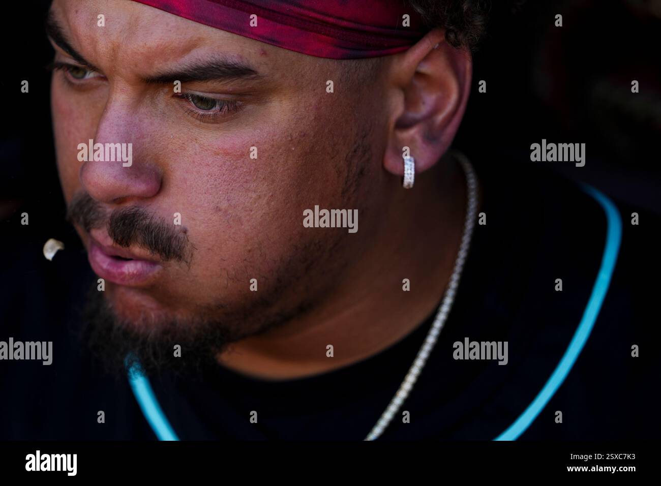 Arizona Diamondbacks' Josh Naylor spits a seed in the dugout before ...