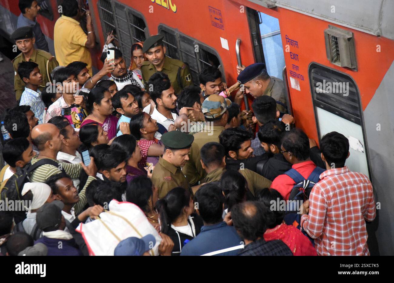 Patna, India. 23rd Feb, 2025. PATNA, INDIA - FEBRUARY 23: Passengers ...