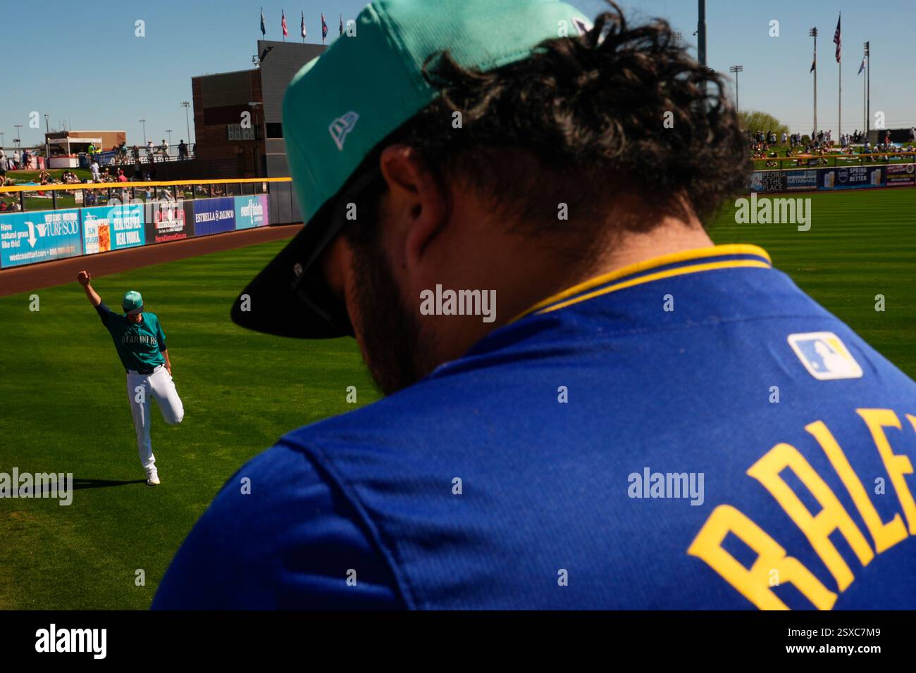 Seattle Mariners starting pitcher Emerson Hancock warms up on the field ...