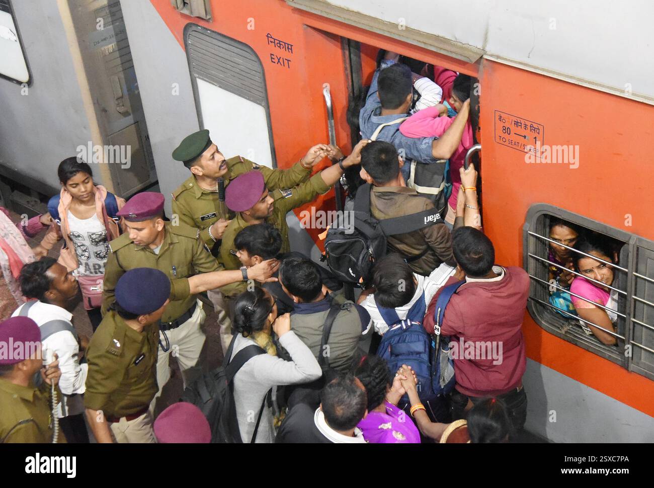 Patna, India. 23rd Feb, 2025. PATNA, INDIA - FEBRUARY 23: Passengers ...