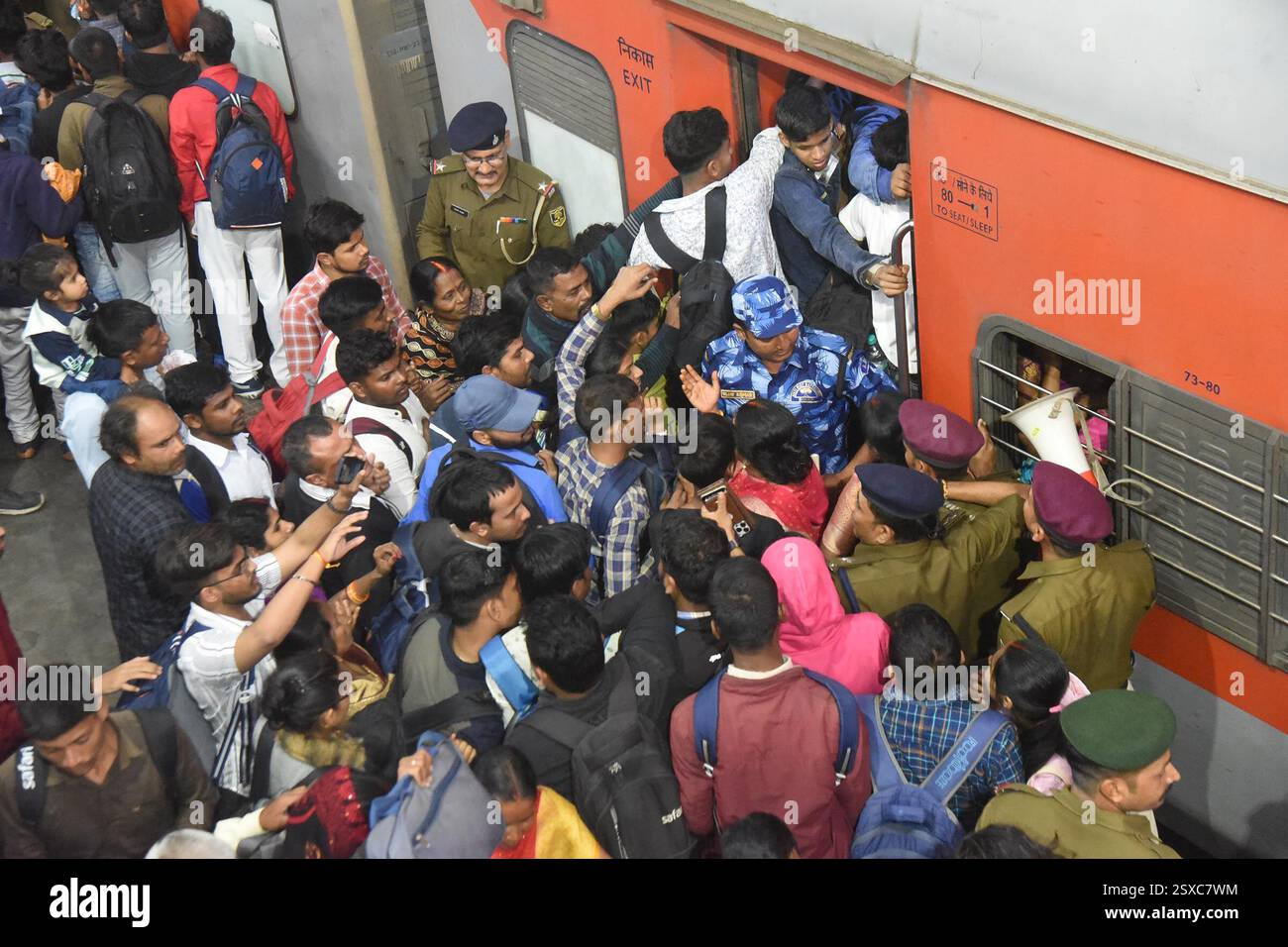 Patna, India. 23rd Feb, 2025. PATNA, INDIA - FEBRUARY 23: Passengers ...