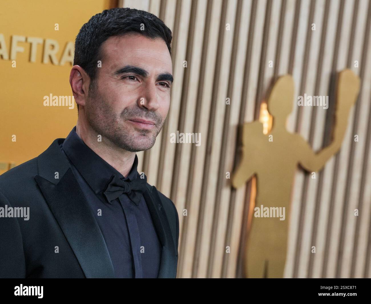 Los Angeles, USA. 23rd Feb, 2025. Brett Goldstein walking on the red ...