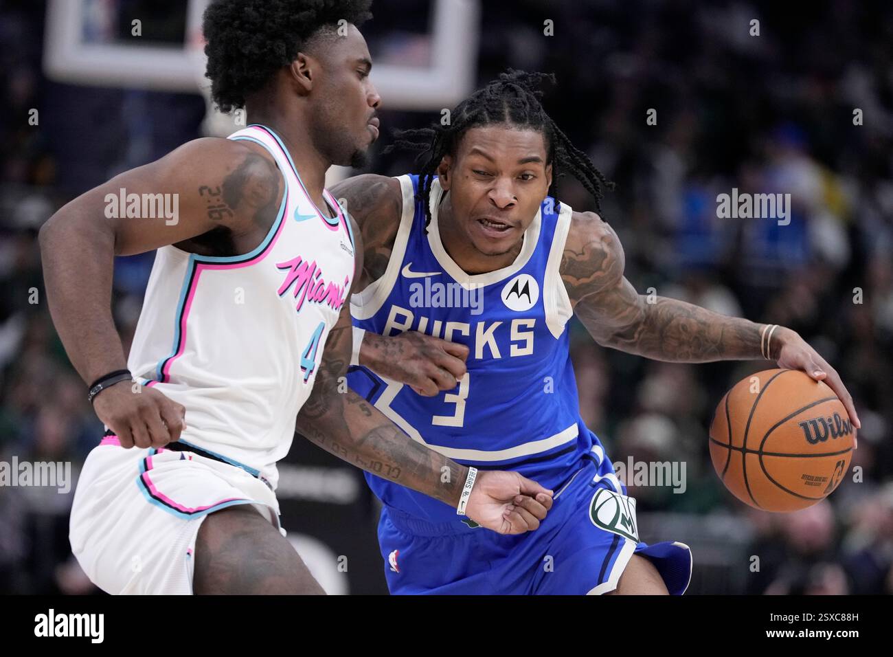 Milwaukee Bucks' Kevin Porter Jr. tries to get past Miami Heat's Davion ...