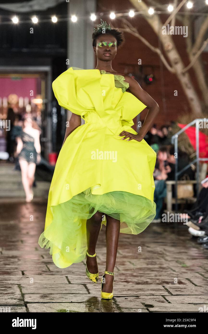 LONDON, UNITED KINGDOM - FEBRUARY 23, 2025: A model walks the runway ...