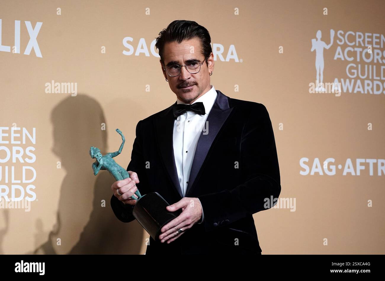 Colin Farrell poses in the press room with the award for outstanding ...