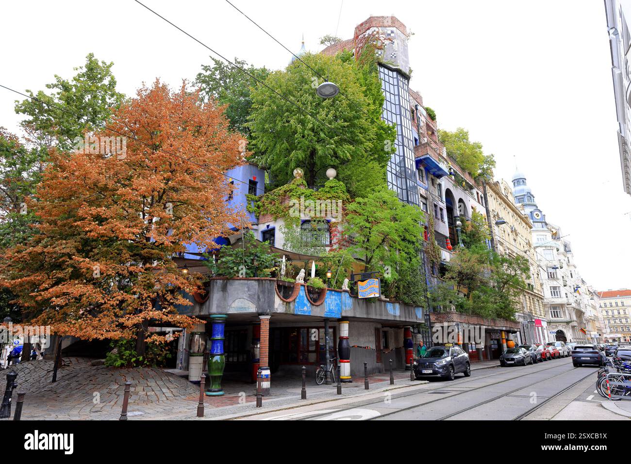 Hundertwasser House, a natural apartment block with a forested roof in ...