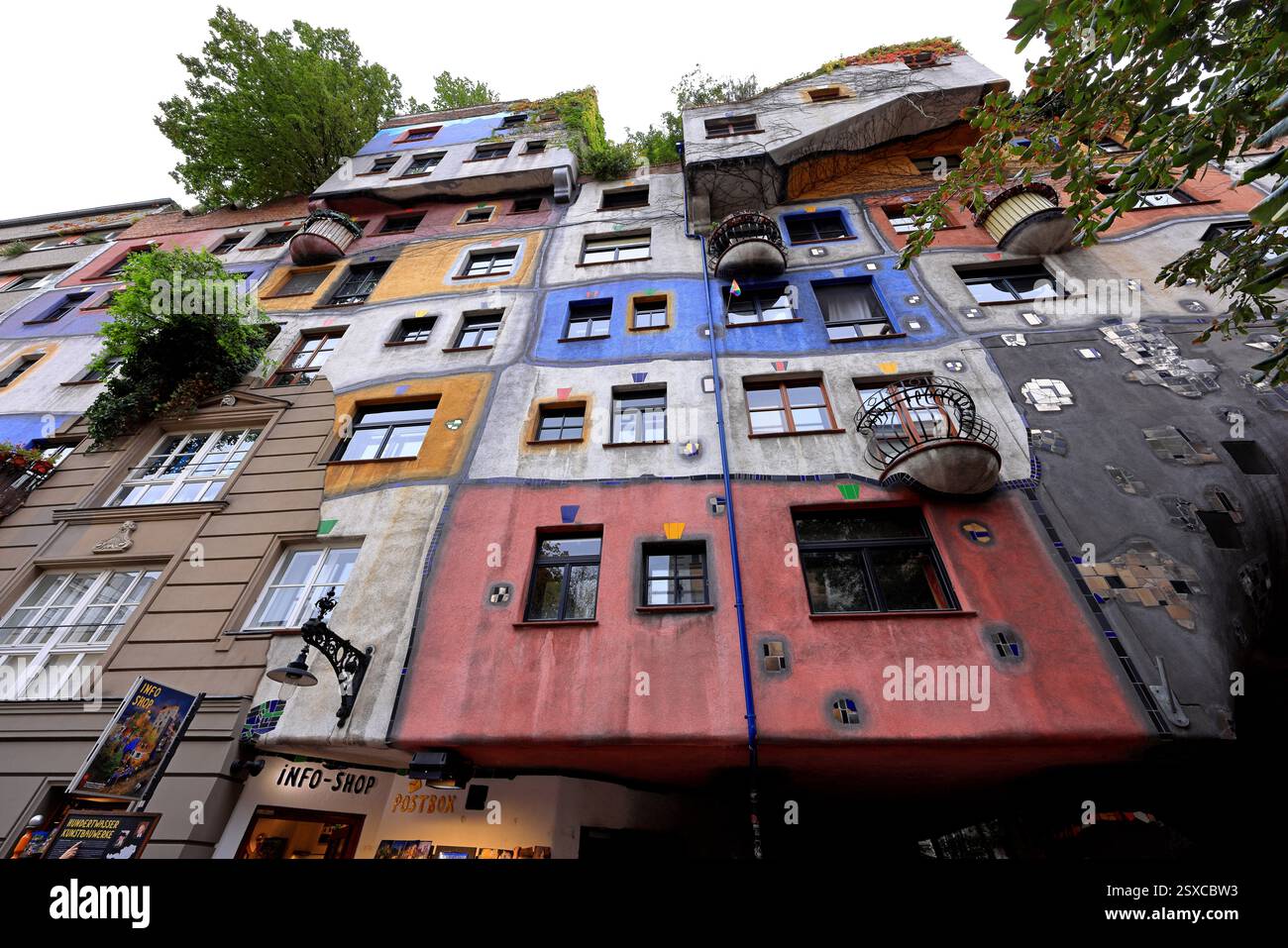 Hundertwasser House, a natural apartment block with a forested roof in ...