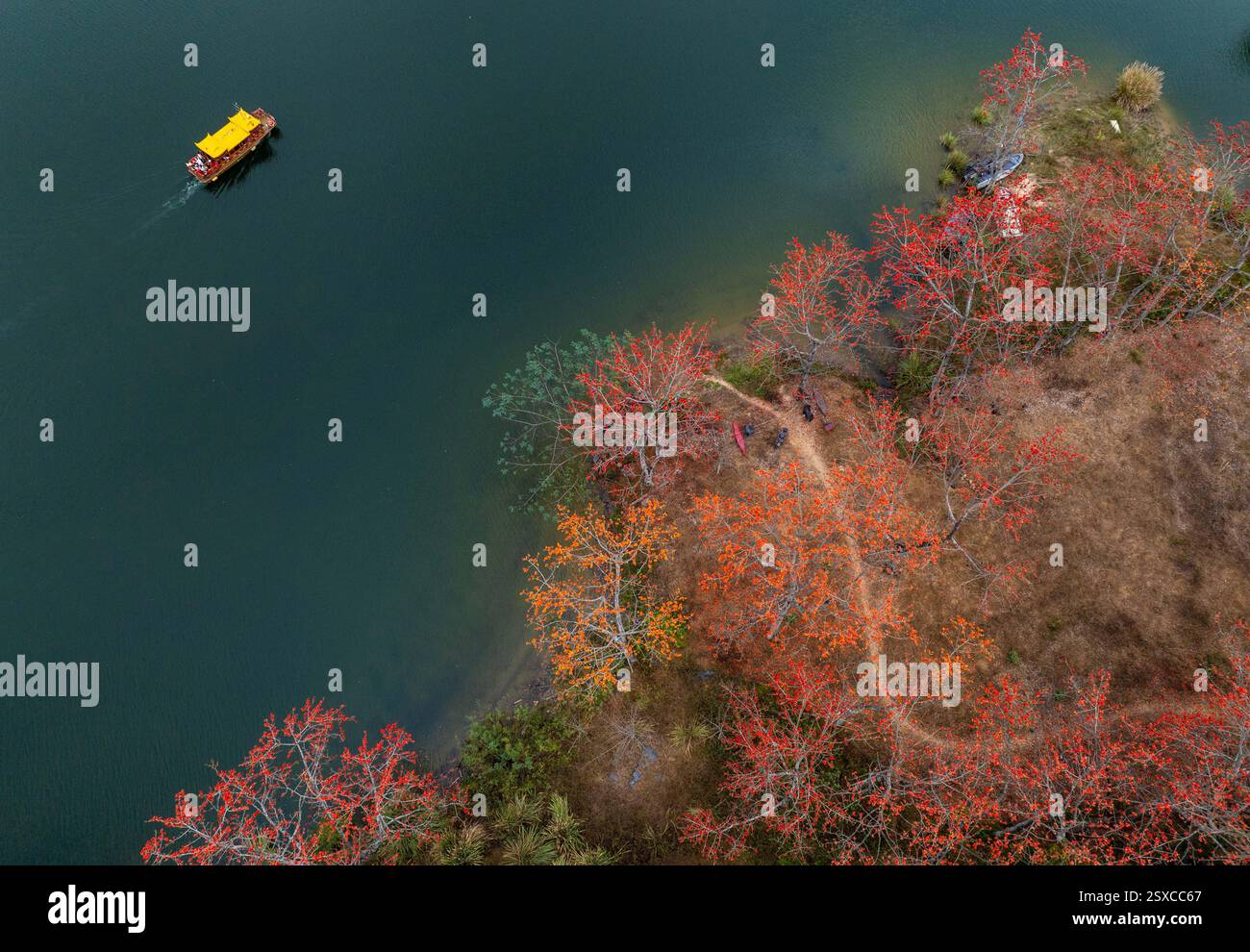 Changjiang,China.21th February 2025. Aerial view of tourists taking a ...