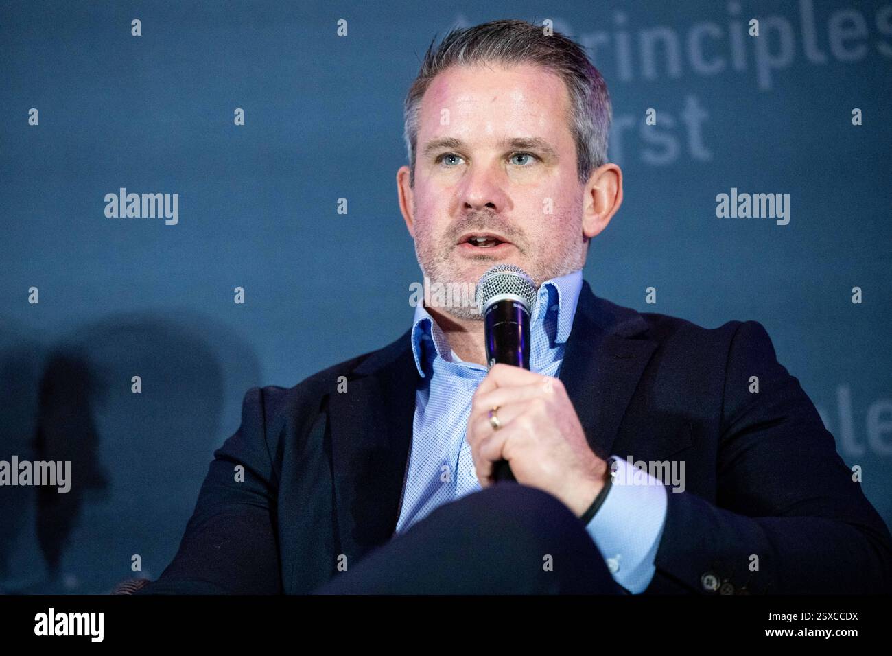 Former Congressman Adam Kinzinger (R) speaking at the Principles First ...