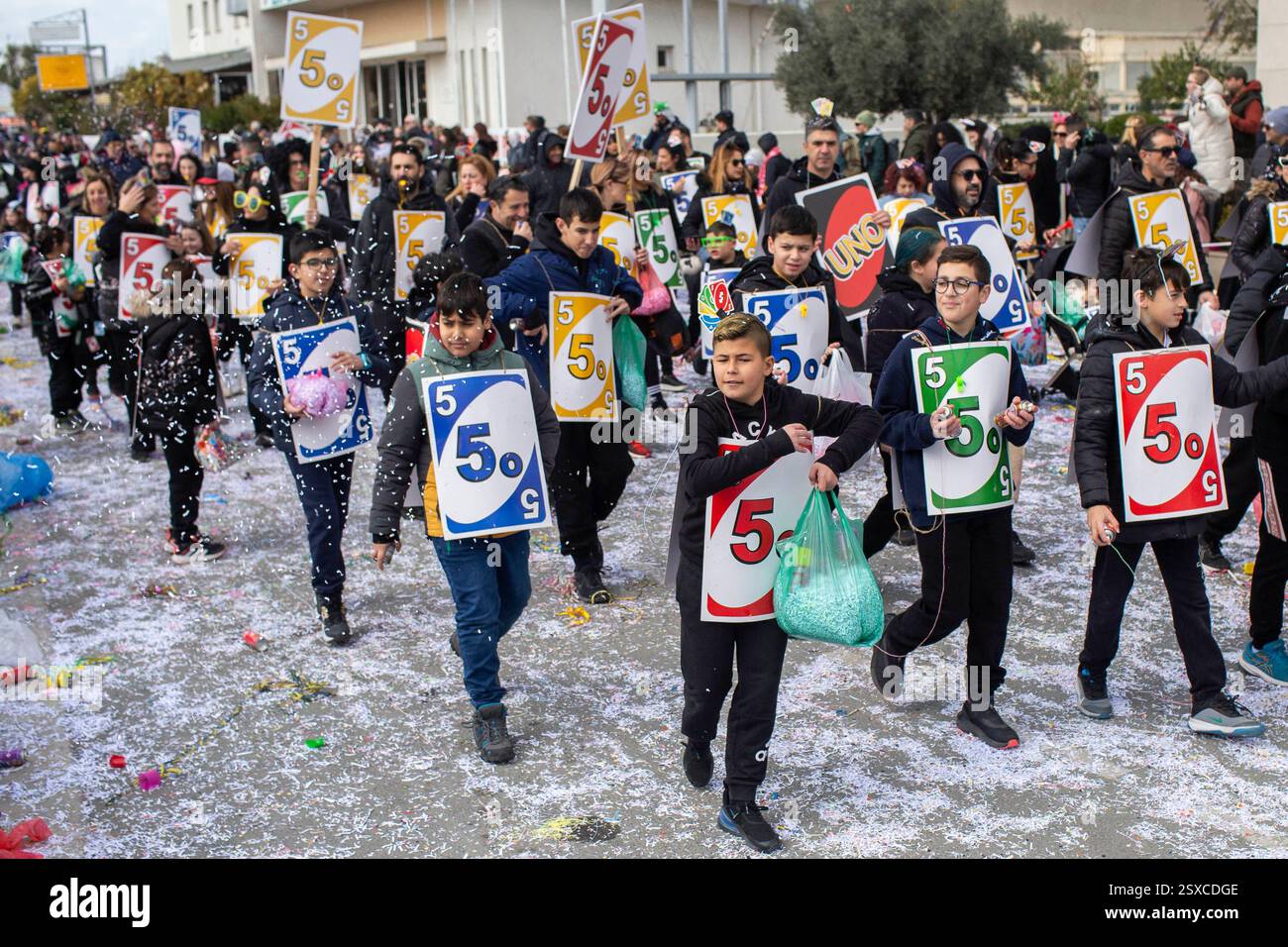 Nicosia, Cyprus. 23rd Feb, 2025. Children in costumes walk on a street ...