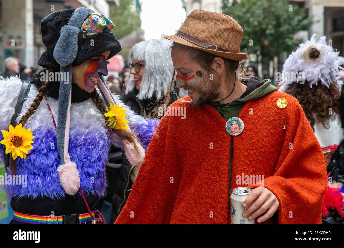 Athens, Greece. 23rd Feb, 2025. People dressed in costumes enjoy ...