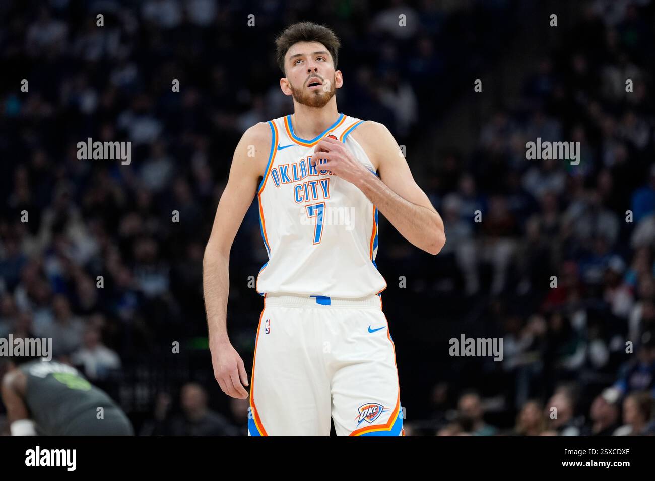 Oklahoma City Thunder forward Chet Holmgren (7) walks across the court ...