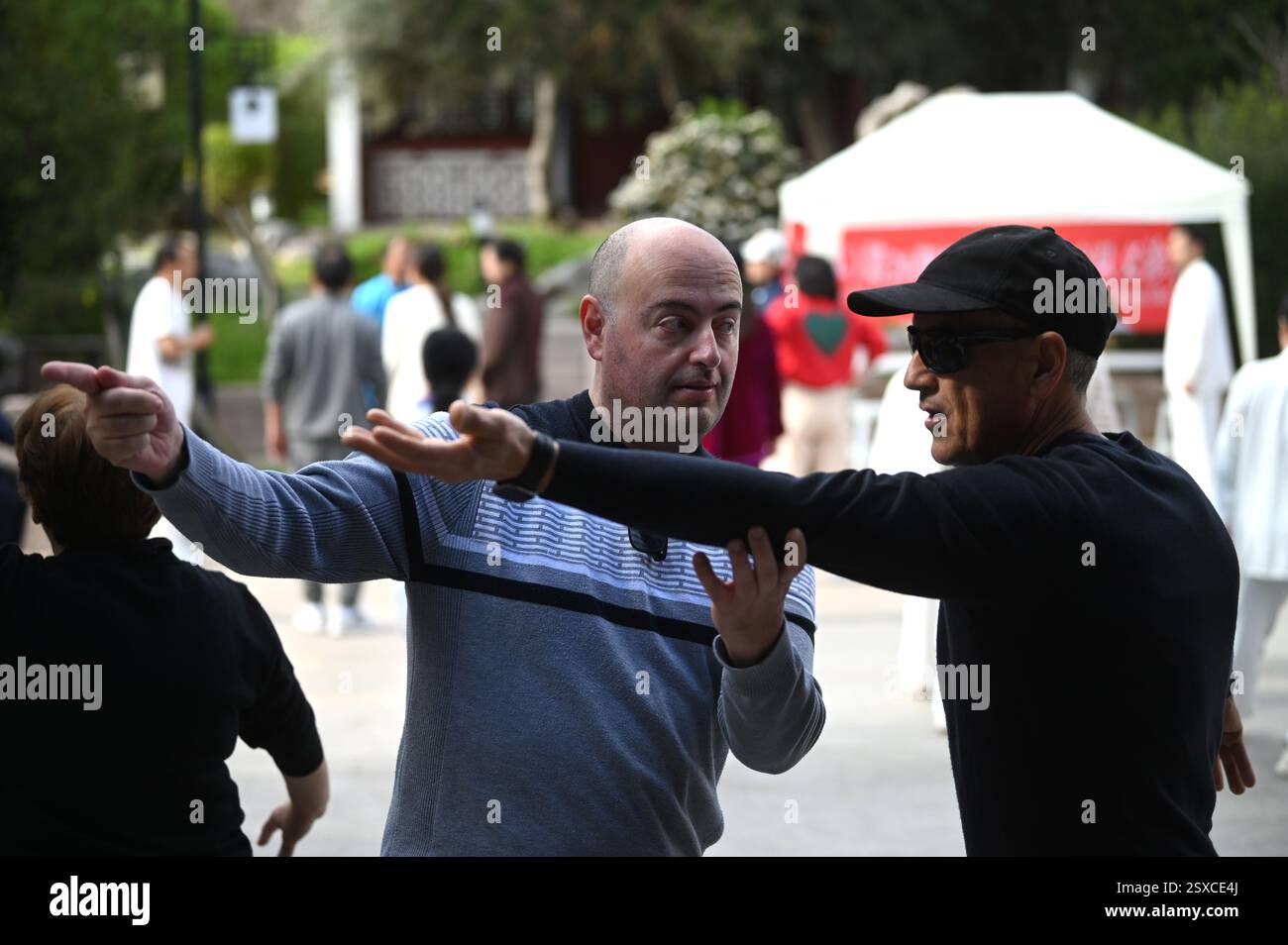 (250224) -- SANTA LUCIJA, Feb. 24, 2025 (Xinhua) -- People practice Tai ...