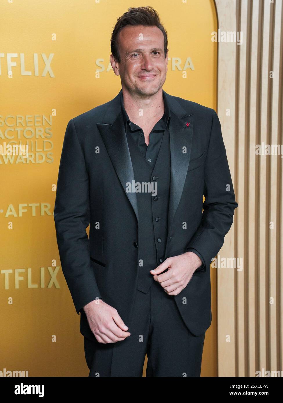 Jason Segel walking on the red carpet at the 31st Annual Screen Actors ...