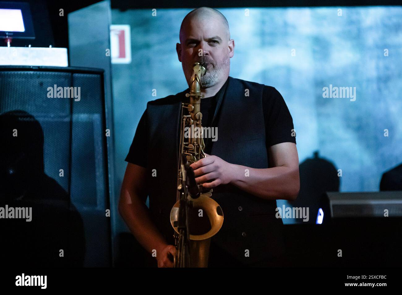 Frank Walden of The Amy Winehouse Band performs live during a concert ...