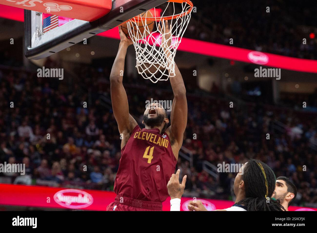Cleveland Cavaliers' Evan Mobley dunks over Memphis Grizzlies' Ja ...