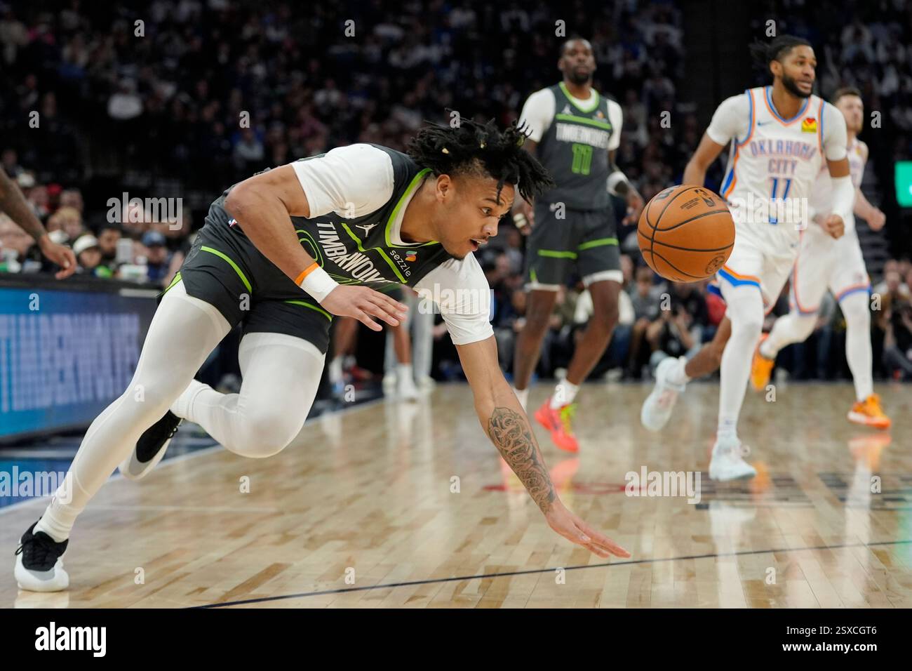 Minnesota Timberwolves guard Terrence Shannon Jr. (00) loses control of ...
