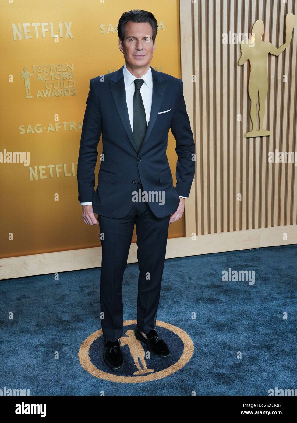 Los Angeles, USA. 23rd Feb, 2025. Adam Glassman walking on the red ...