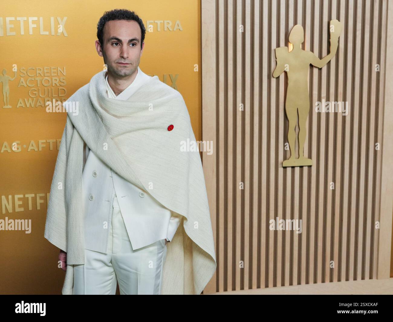 Los Angeles, USA. 23rd Feb, 2025. Khalid Abdalla walking on the red ...