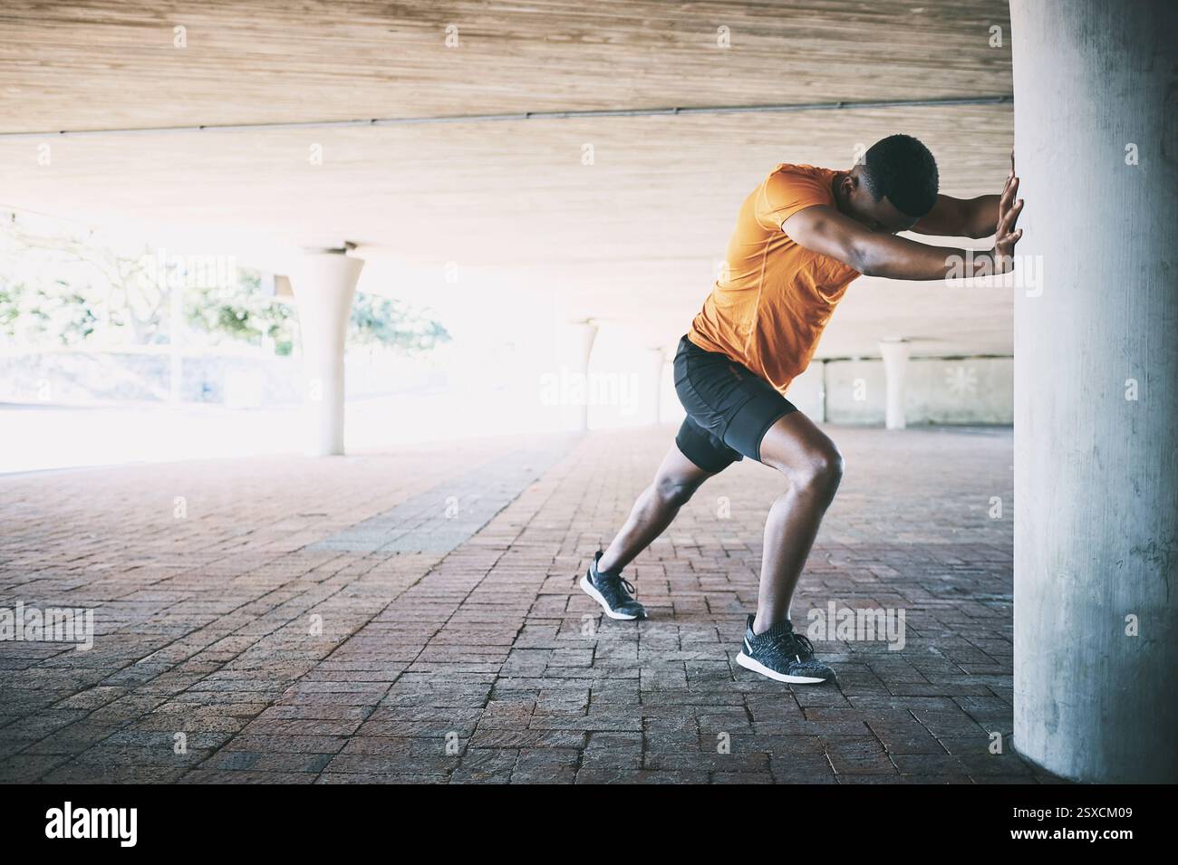 Fitness, workout and man with calf stretching in parking lot for ...