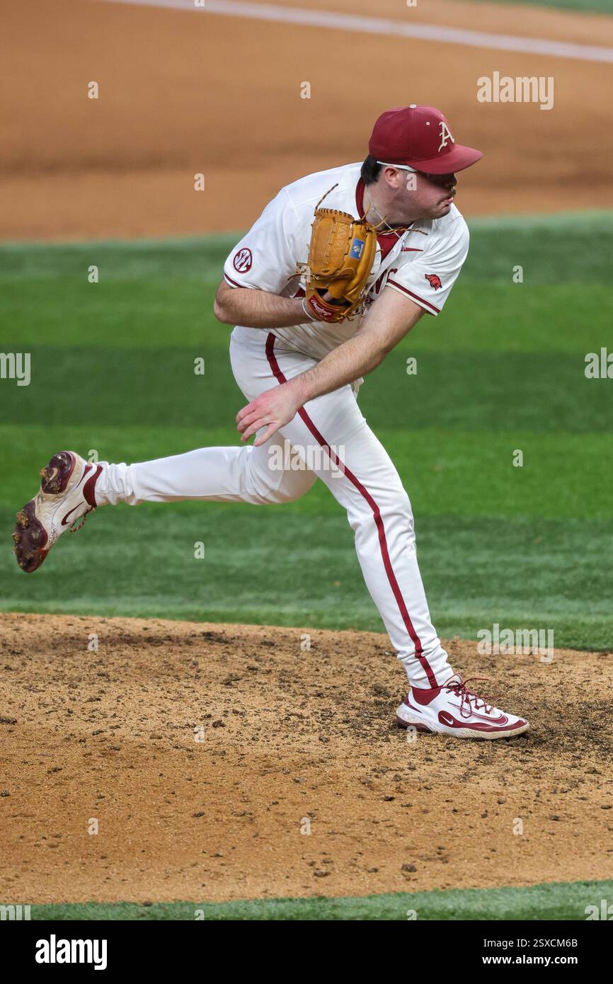 February 23, 2025: Hogs pitcher Colin Fisher (38) finishes his pitching ...