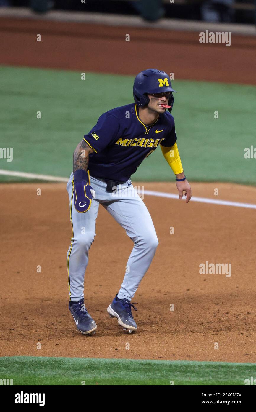 February 23, 2025: Benny Casillas (8) of Michigan works his way off the ...