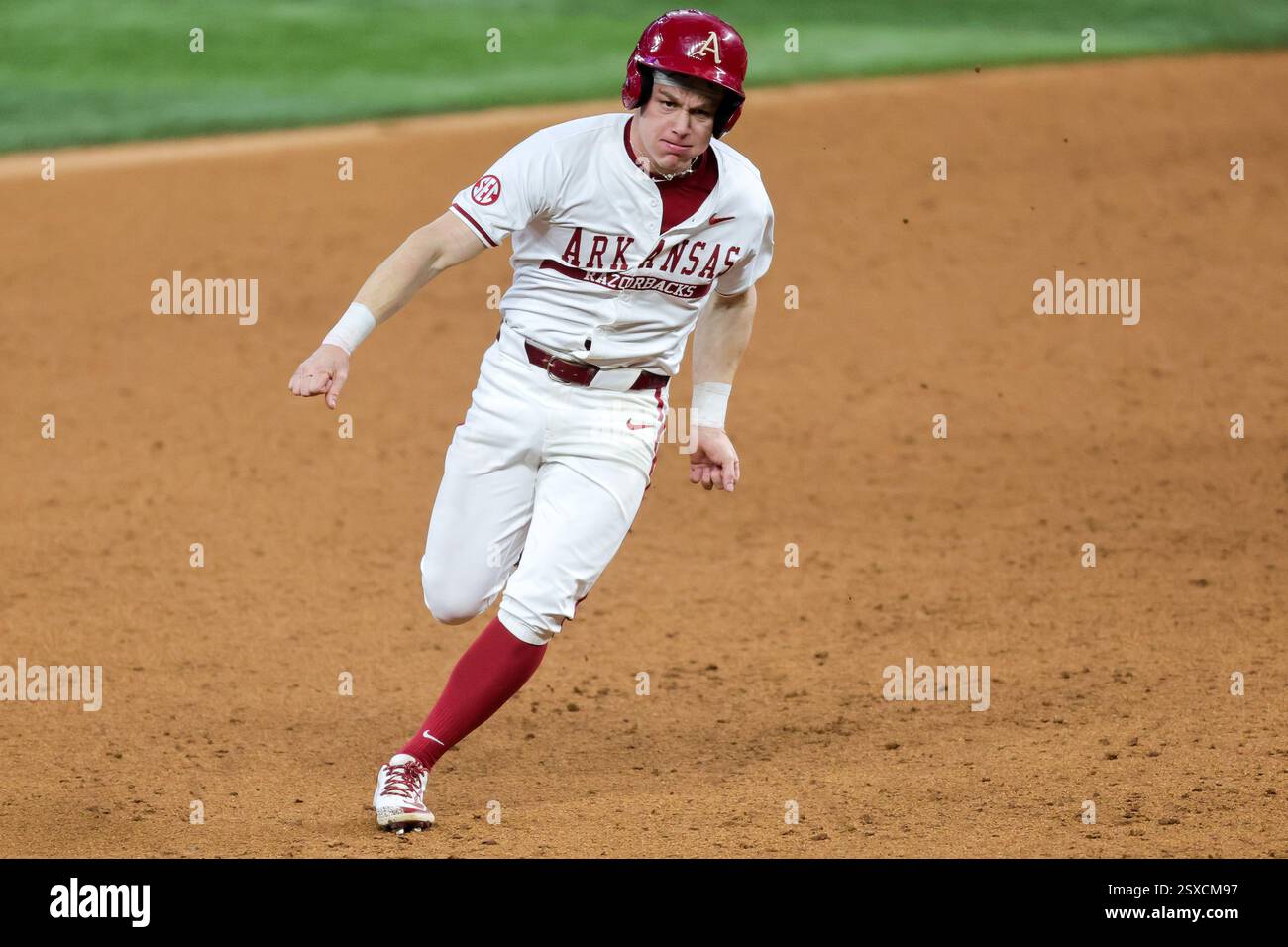 February 23, 2025: Charles Davalan (24) of Arkansas comes around the ...