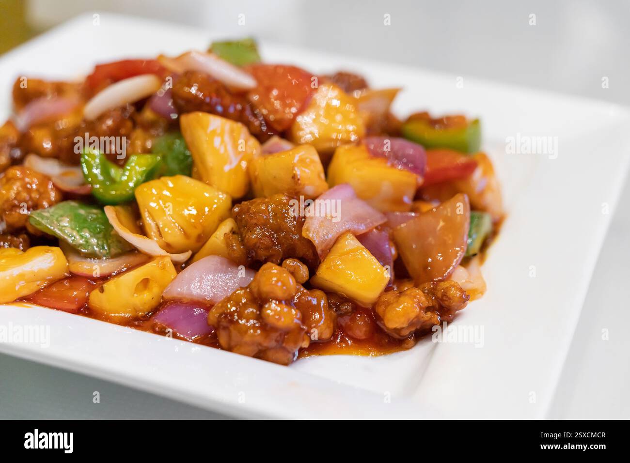 Sweet and sour pork is a popular Chinese dish known for its vibrant ...
