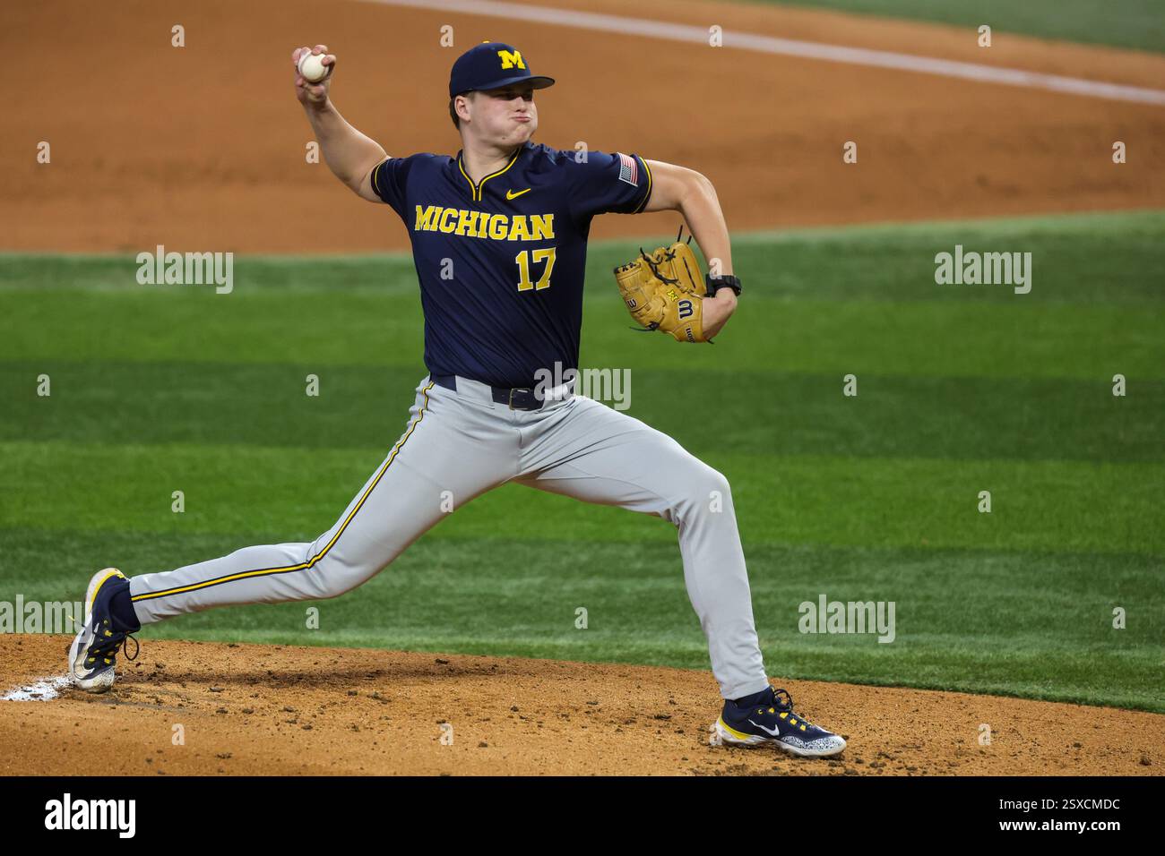 February 23, 2025: Wolverines pitcher Gavin DeVooght (17) works from ...