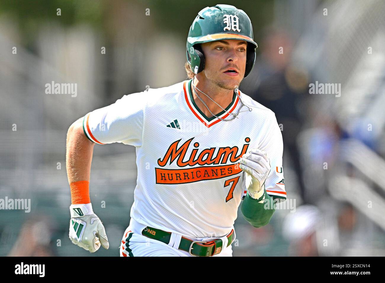 CORAL GABLES, FL - FEBRUARY 23: Miami outfielder Max Galvin (7) runs to ...