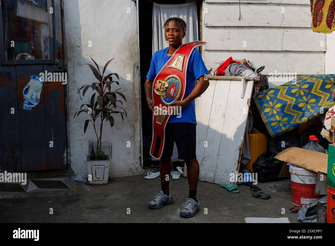 Ghana's first-ever female world boxing champion, Abigail Kwartekaa Quartey, poses for a photo ...