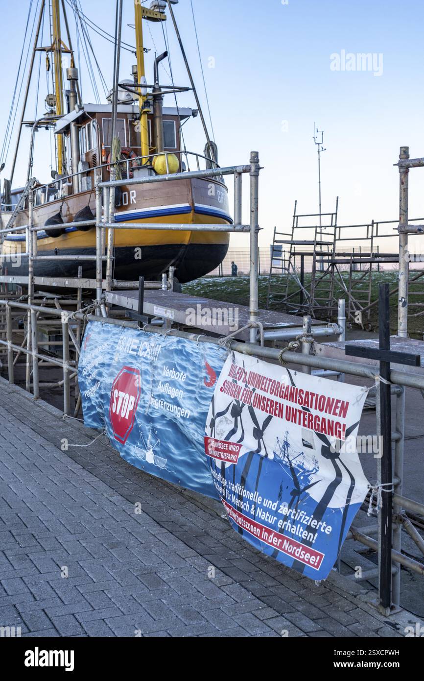 The fishing village of Greetsiel, historic fishing harbour, with the ...