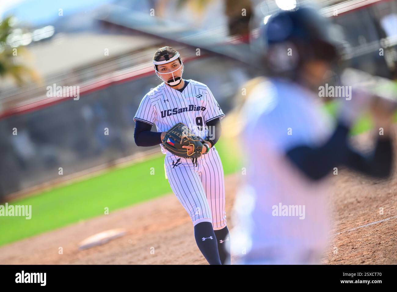 UC San Diego pitcher Callie Christian (99) pitches to Utah State batter ...