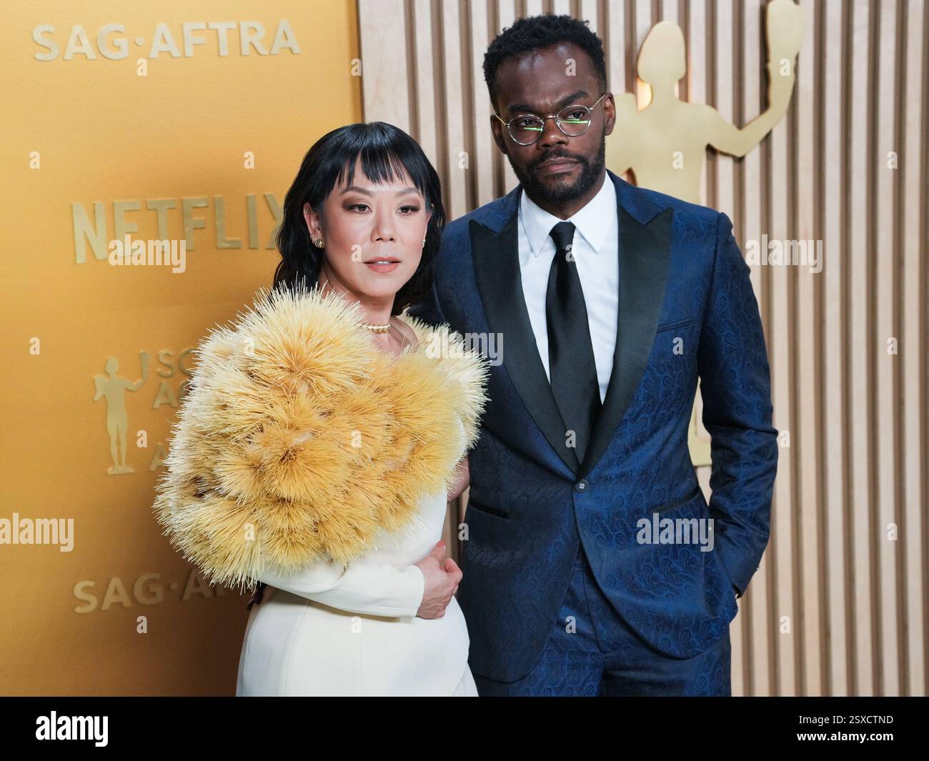 Los Angeles, USA. 23rd Feb, 2025. Ali Ahn and William Jackson Harper ...
