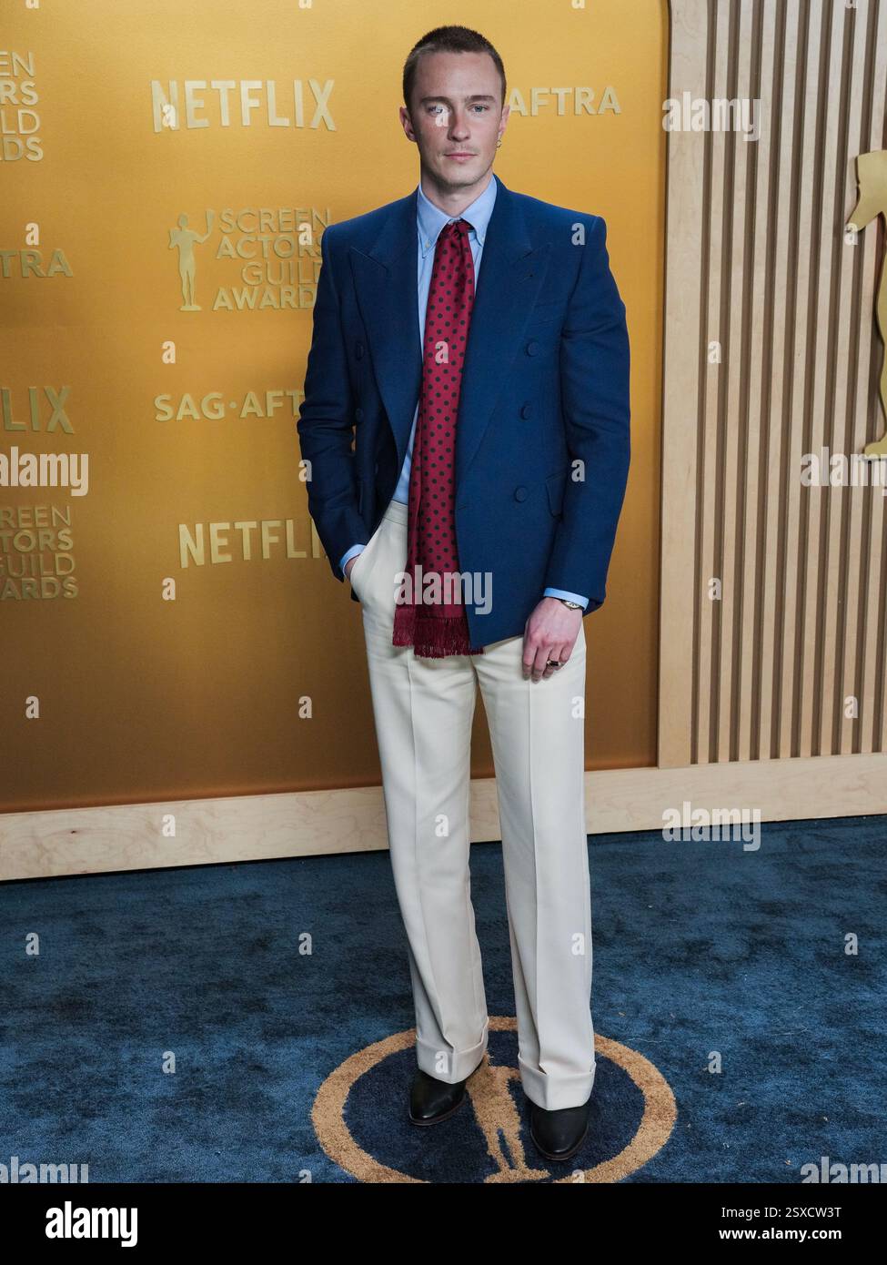 Drew Starkey walking on the red carpet at the 31st Annual Screen Actors ...