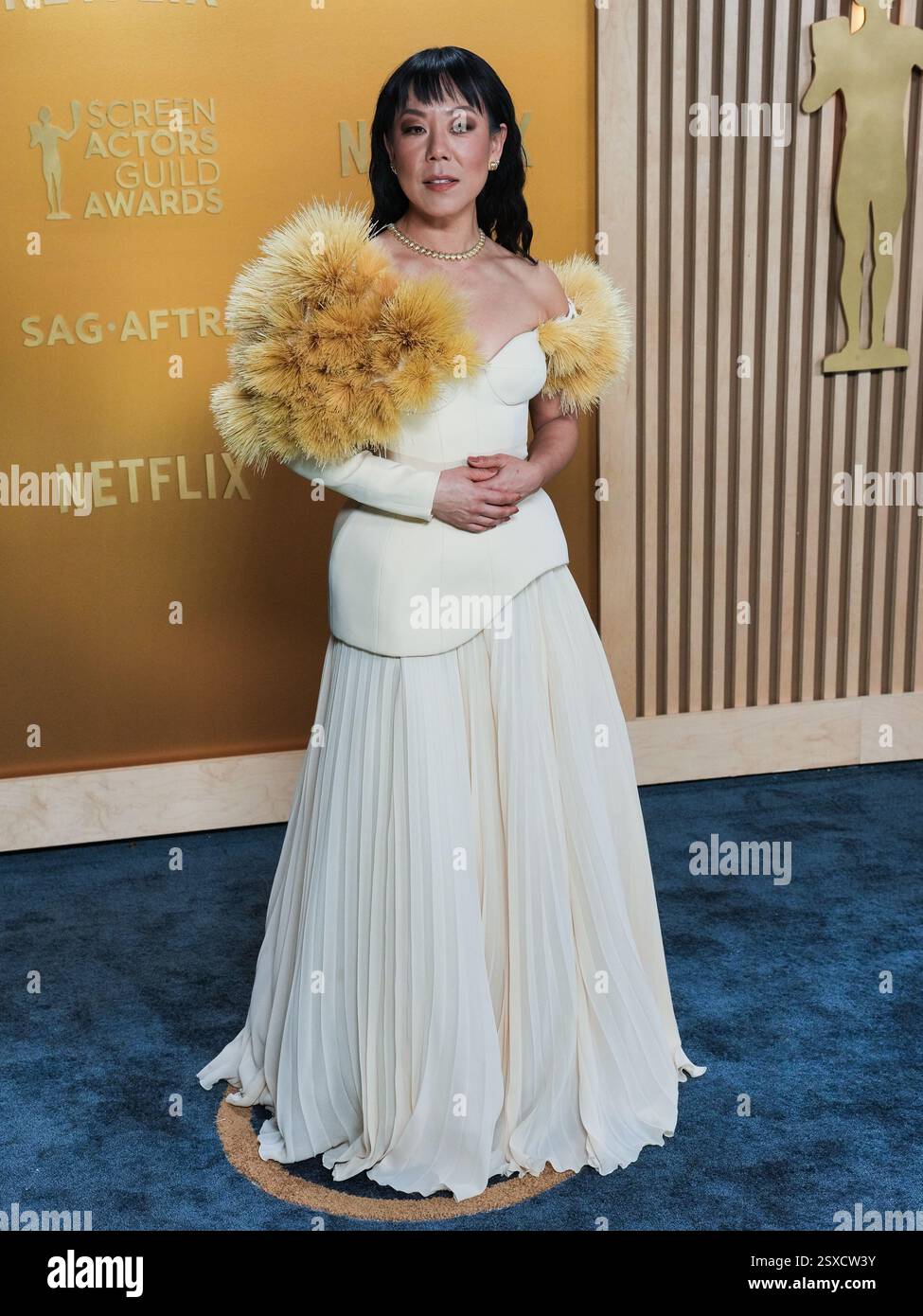 Ali Ahn walking on the red carpet at the 31st Annual Screen Actors ...