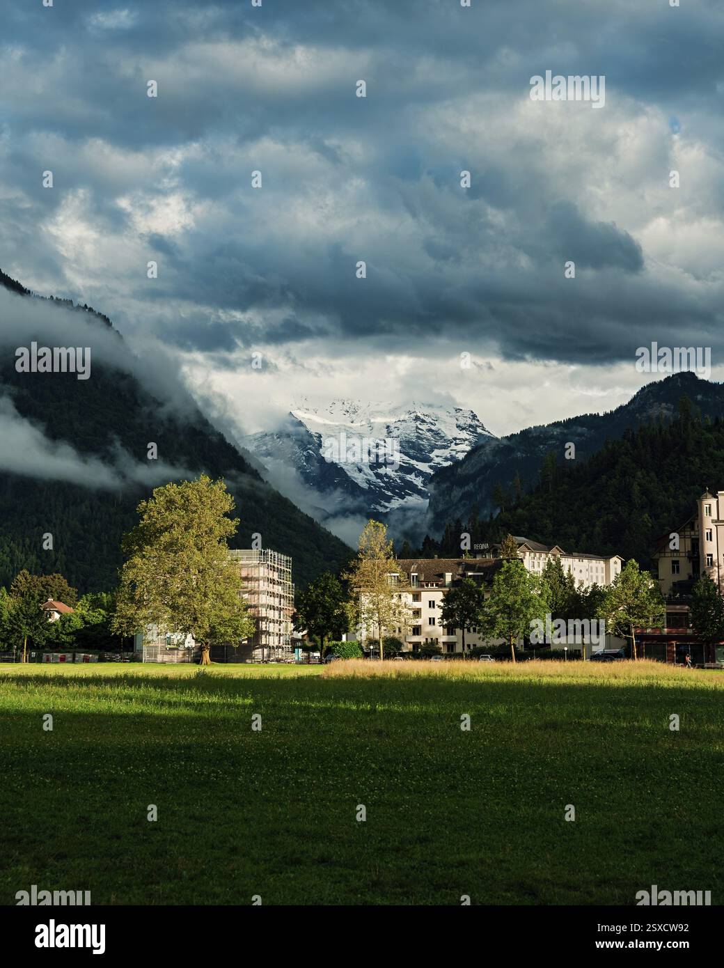 A picturesque mountain scene with architecture blending into the ...
