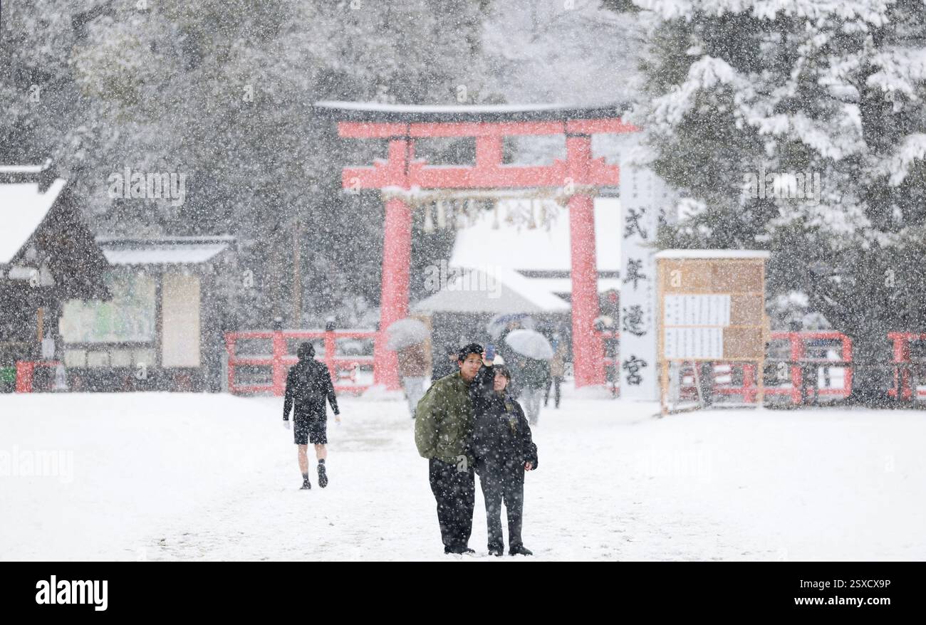 Snow falls in Kyoto City, Kyoto Prefecture on February 24, 2025. Due to ...