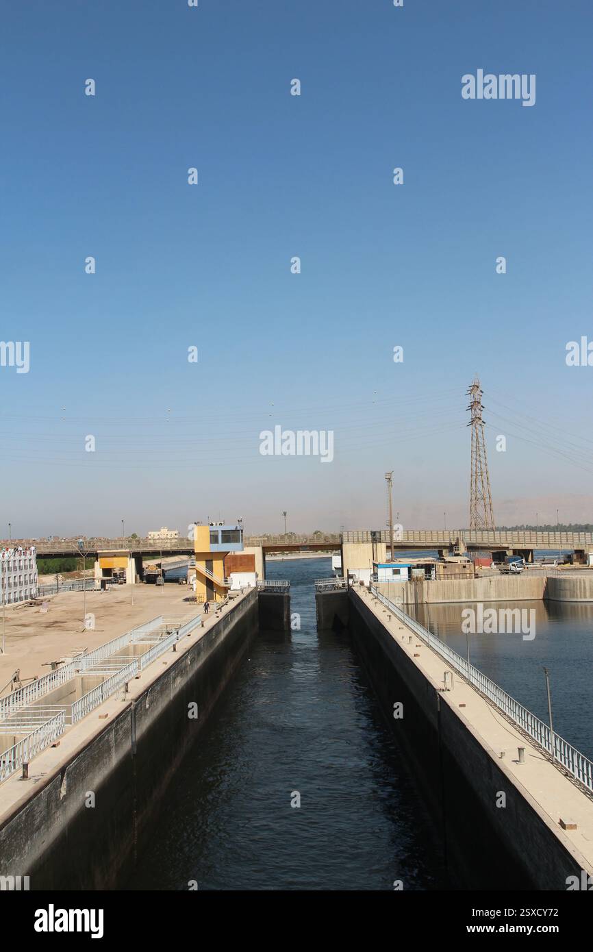 In front of the gate of Esna Lock as an elevator for boats on the River ...