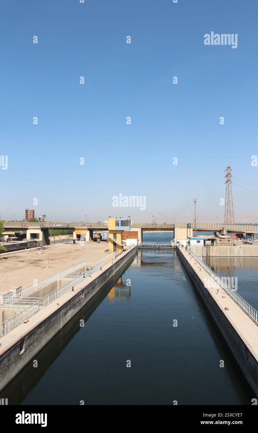 In front of the gate of Esna Lock as an elevator for boats on the River ...