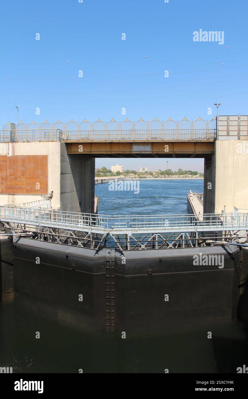 In front of the gate of Esna Lock as an elevator for boats on the River ...