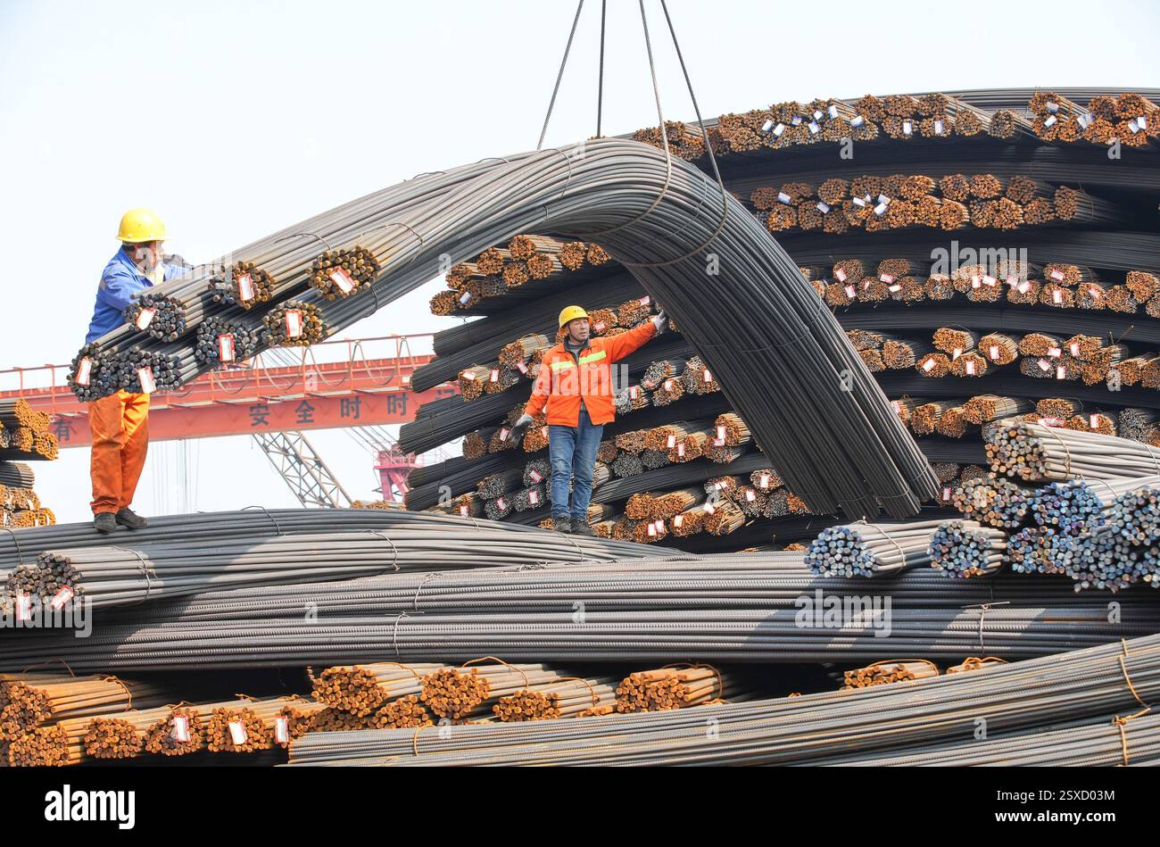 Workers work at the steel logistics area of Baoping iot warehouse base ...