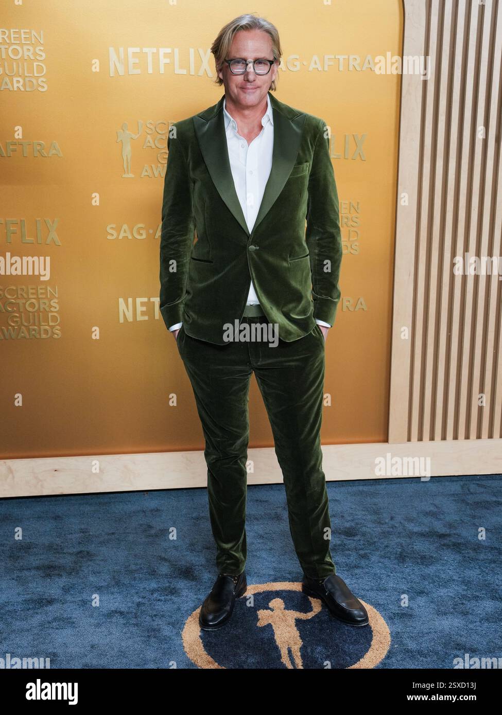 Los Angeles, USA. 23rd Feb, 2025. John Brockett walking on the red ...