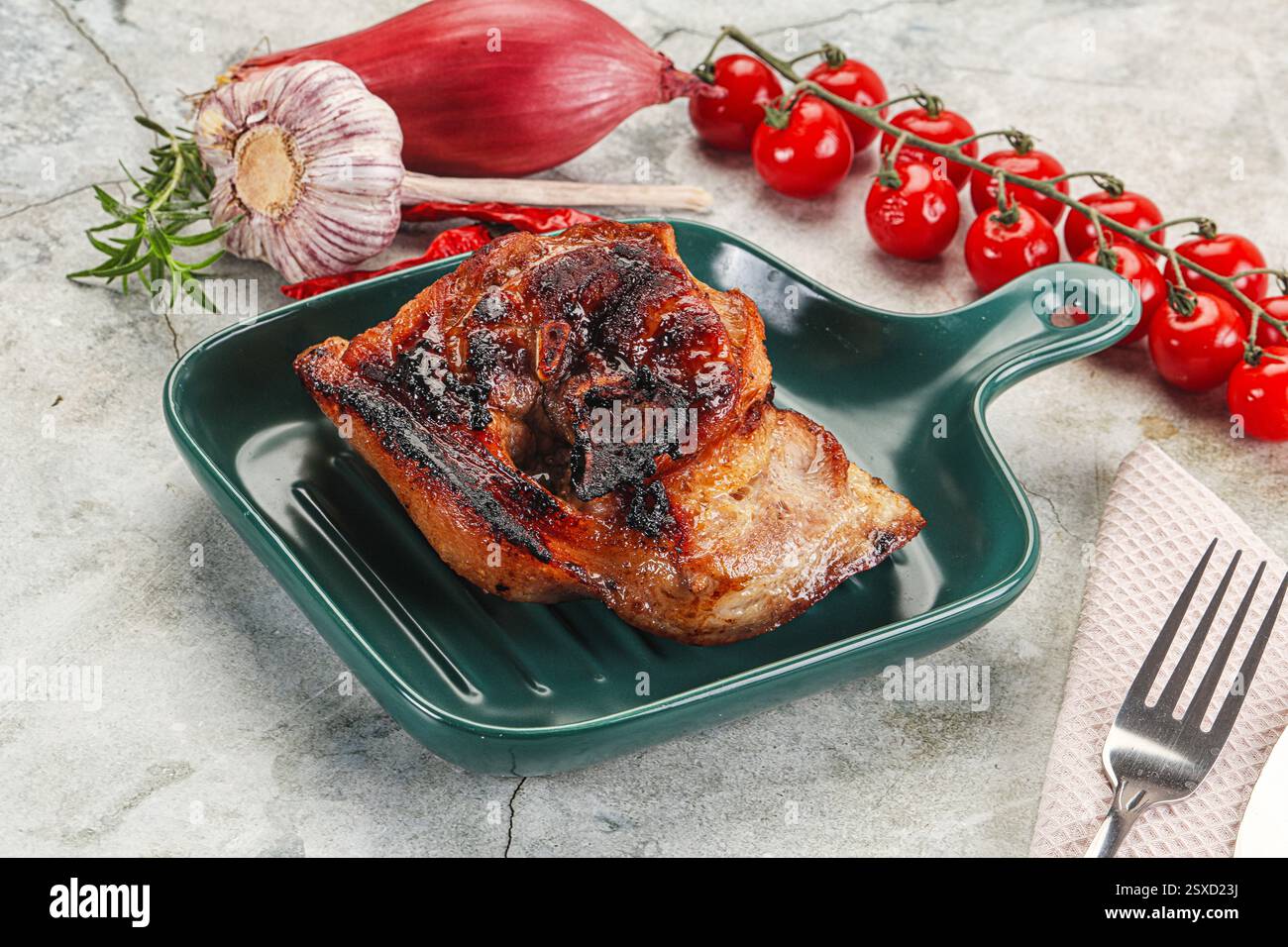 Roasted pork knuckle steak with bone Stock Photo - Alamy