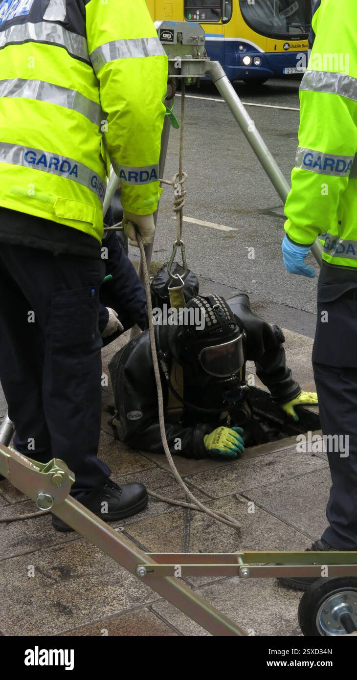 Dublin, Ireland - 11th April 2013 - A Garda Officer in hazmat suit and ...