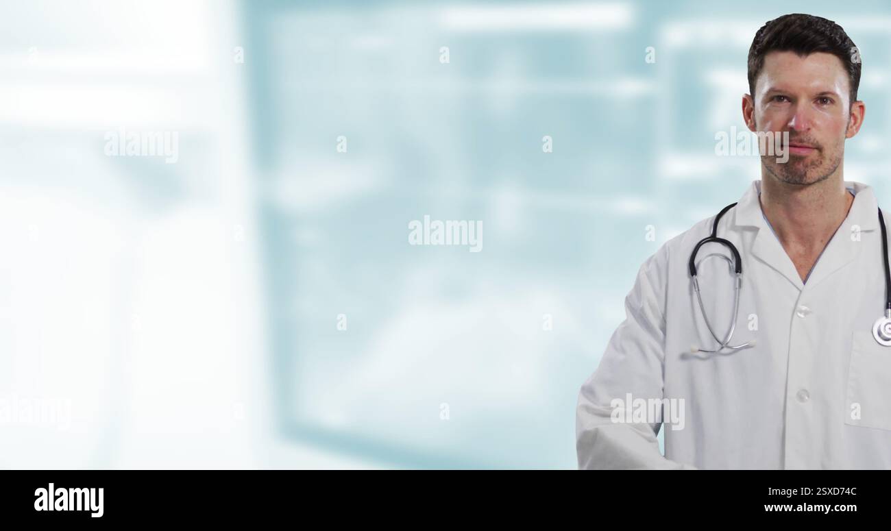 Image of caucasian male doctor wearing stethoscope on blurred ...
