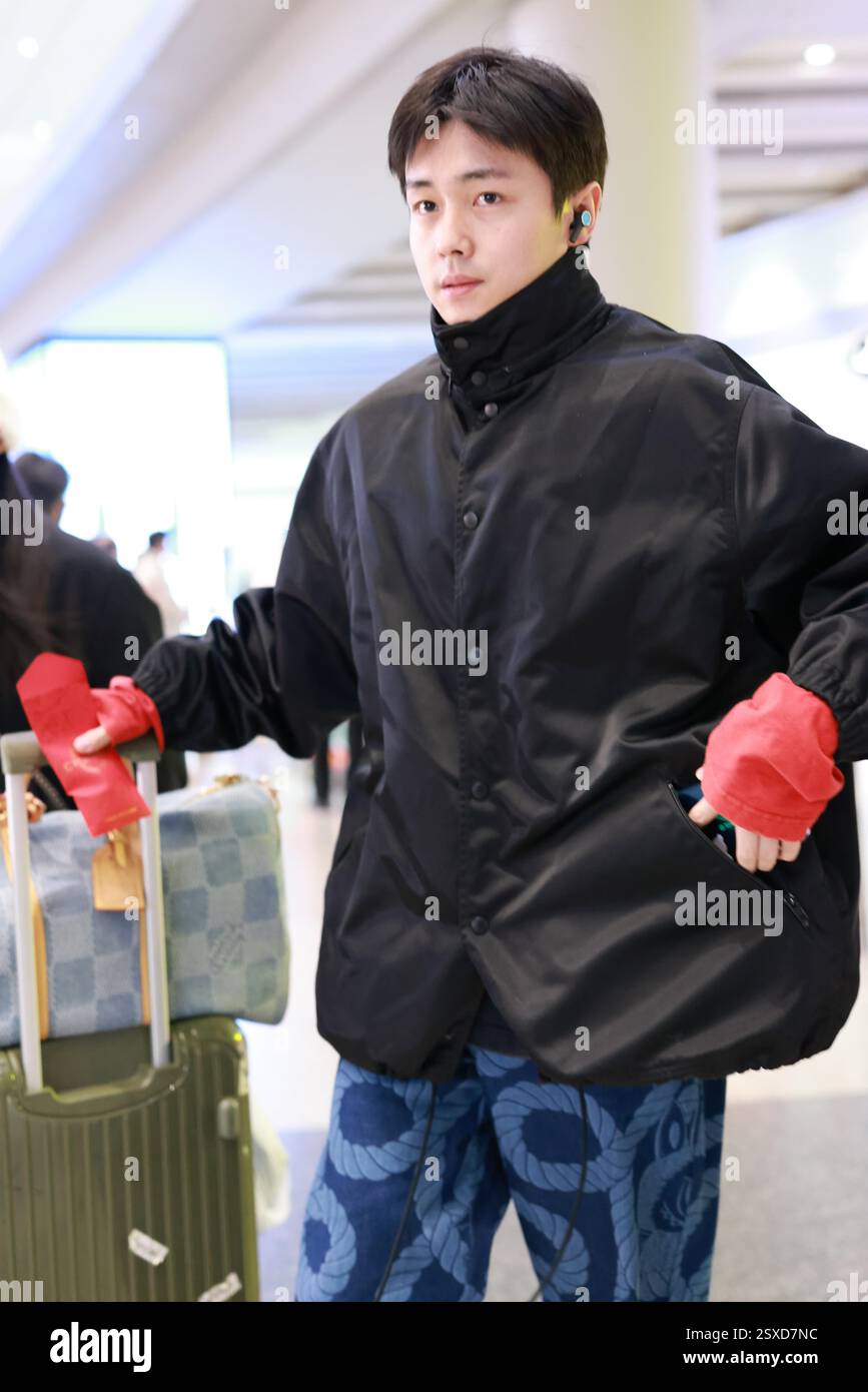 Chinese actor Zhai Zilu appears at the airport in Beijing, China, 21 ...