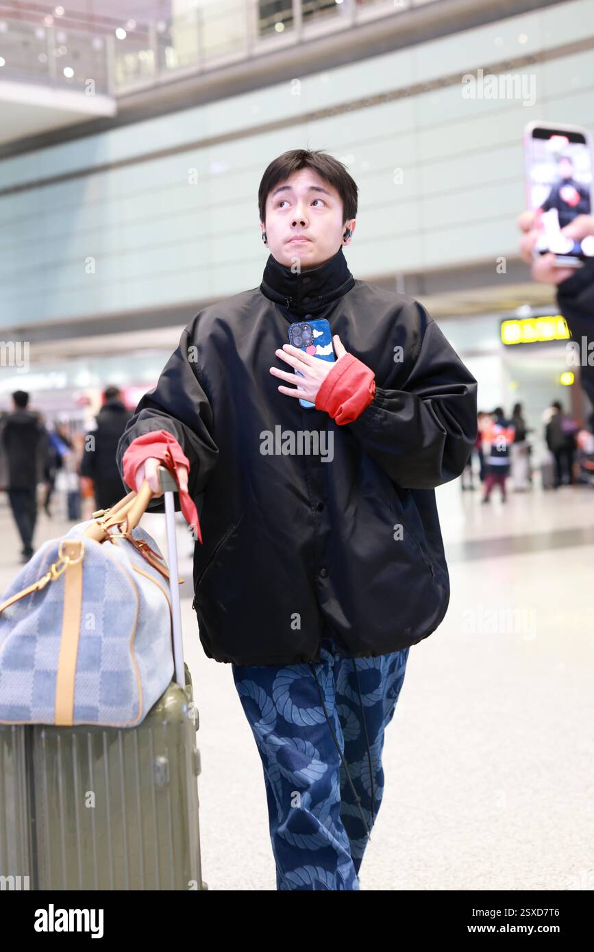 Chinese actor Zhai Zilu appears at the airport in Beijing, China, 21 ...